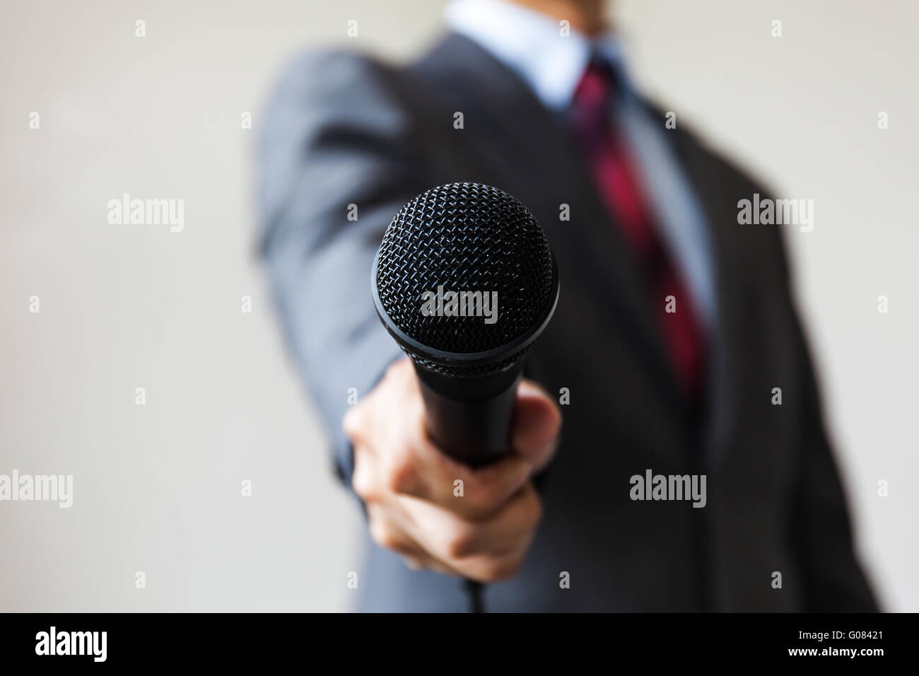 Black man male tv journalist reporter media holding microphone speaking ...
