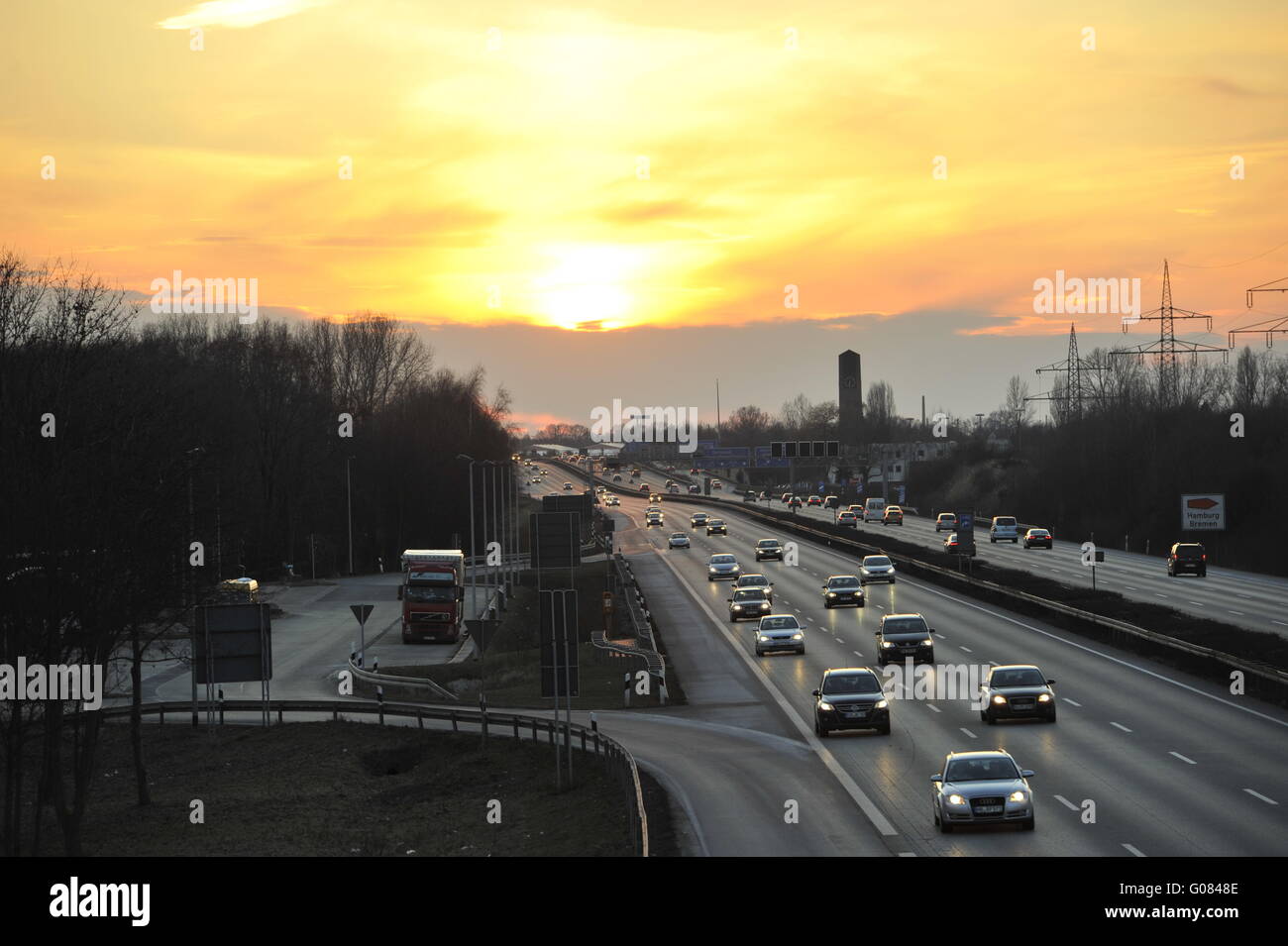Highway Landscape with electricity pylons Stock Photo - Alamy