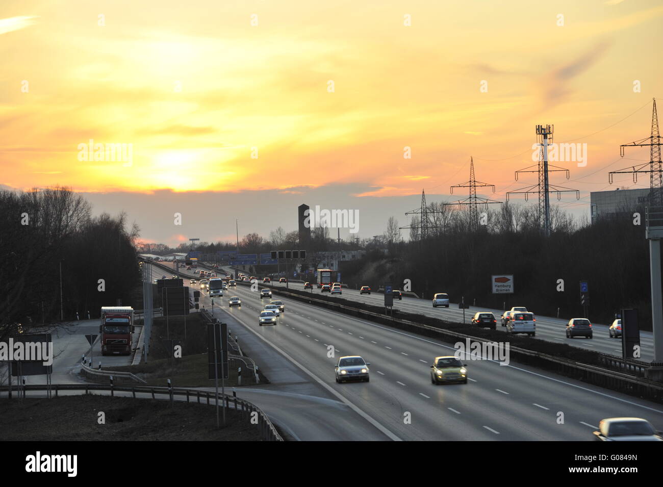 Highway Landscape with electricity pylons Stock Photo - Alamy