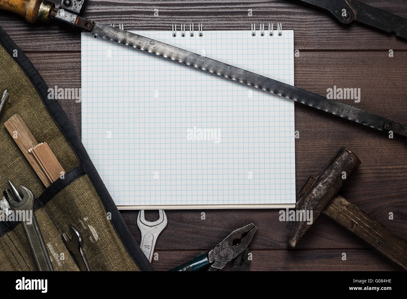 construction tools and blank notepad on the wooden Stock Photo - Alamy