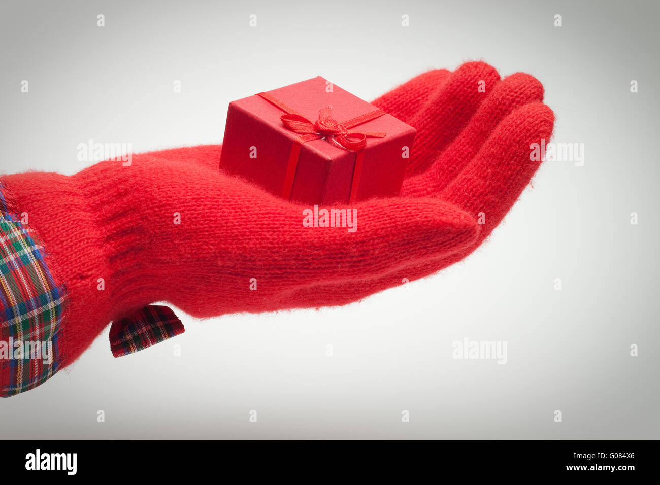 hand giving present isolated over white background Stock Photo - Alamy