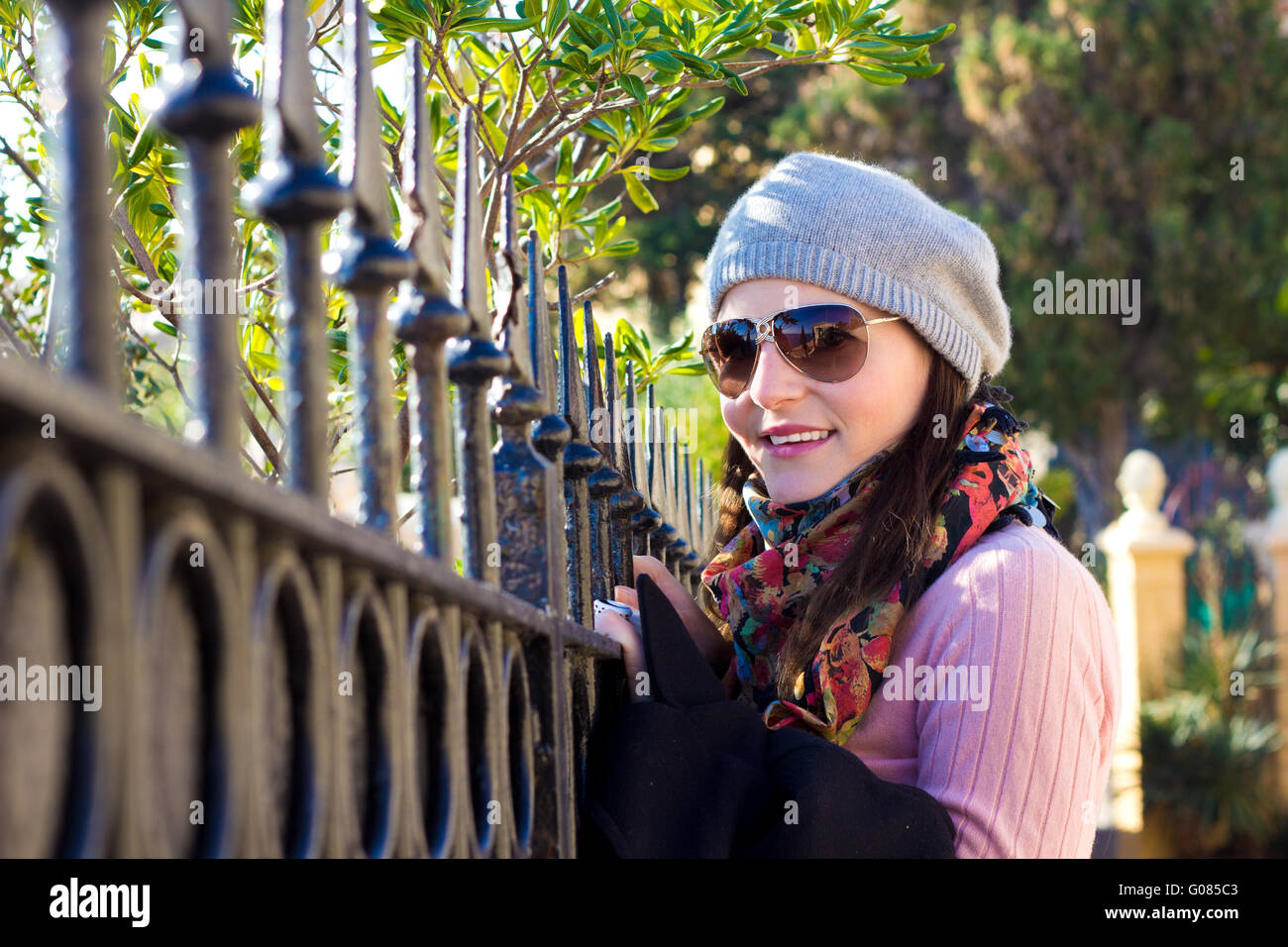 Person looking over fence hi-res stock photography and images - Alamy