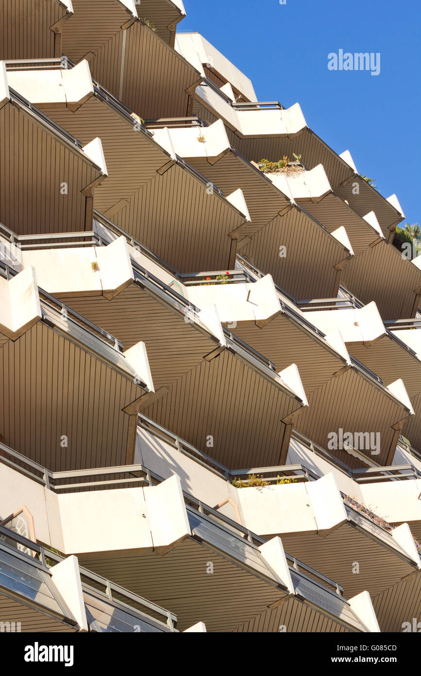 Front Side Of A Large Building With Many Terraces Stock Photo - Alamy