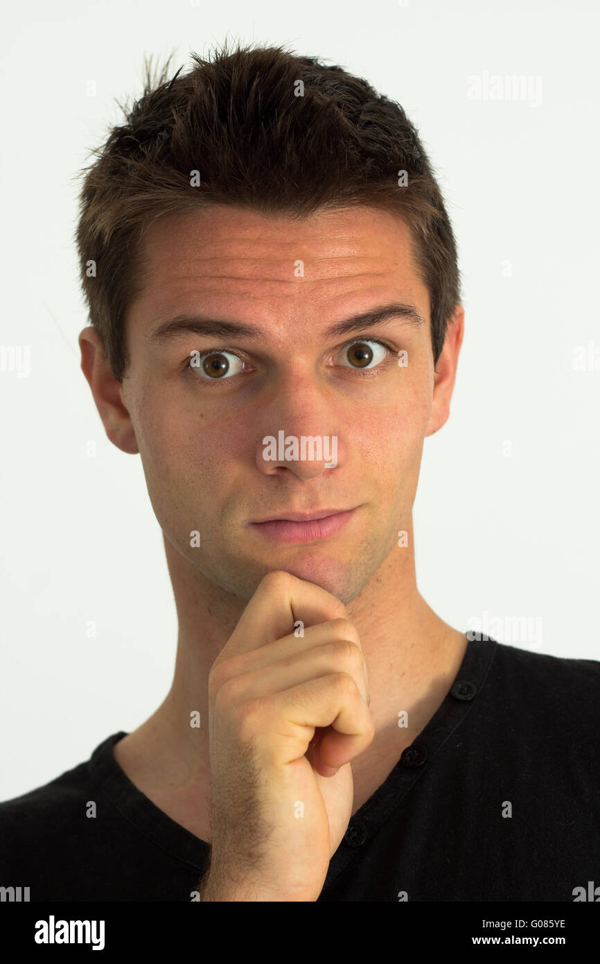 Boy thinking hand chin portrait hi-res stock photography and images - Alamy