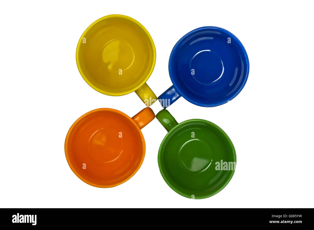 Four colorful cups, top view Stock Photo - Alamy
