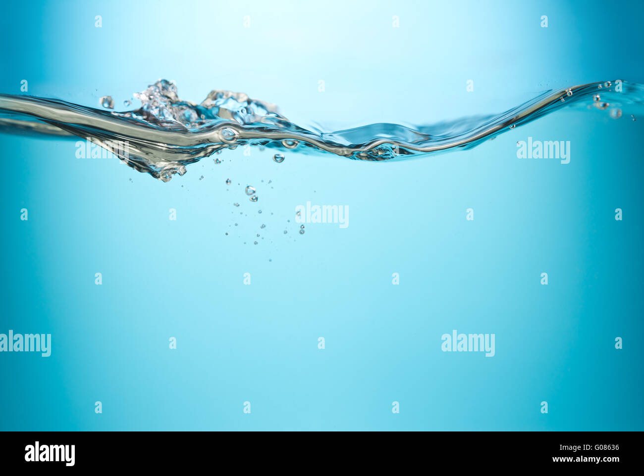 Blue water wave Stock Photo - Alamy
