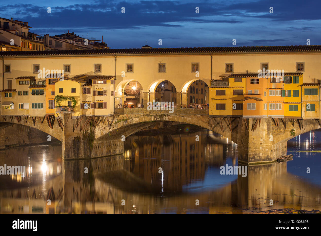 View of Gold (Ponte Vecchio) Bridge at night in Florence, Tuscany ...
