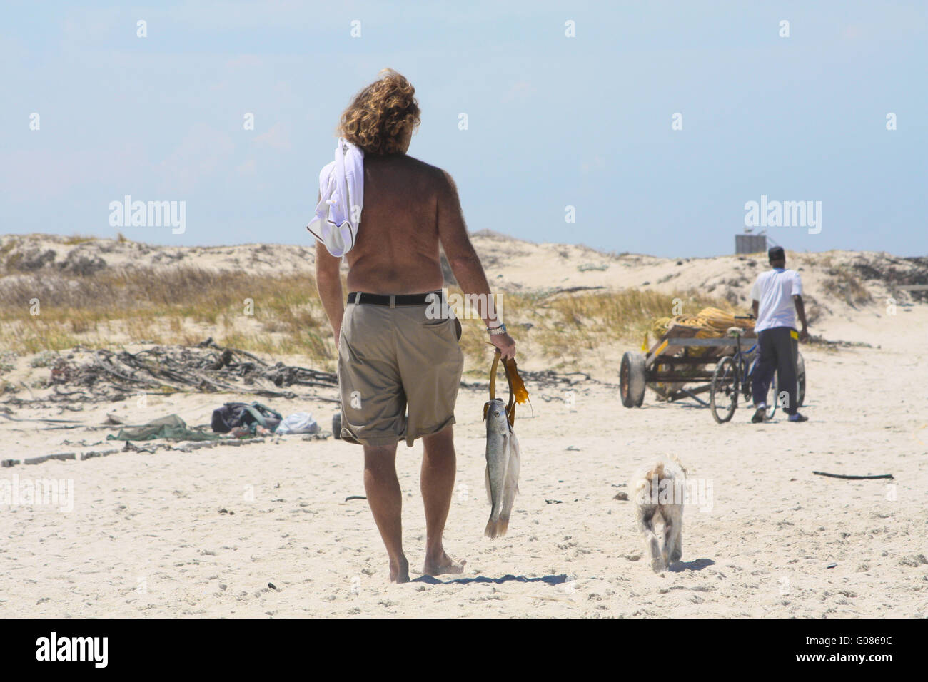 Back of man and dog hi-res stock photography and images - Alamy
