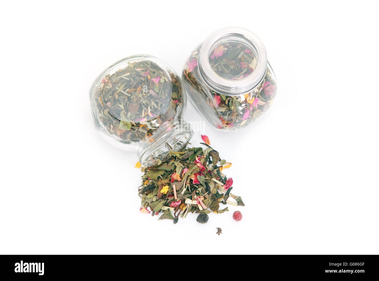 white tea with dry flower in jars Stock Photo - Alamy