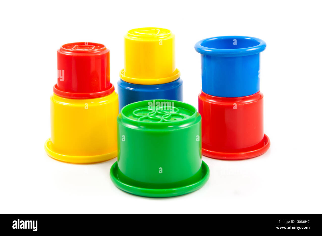 Colorful toys for kids. colorful plastic cups on t Stock Photo - Alamy