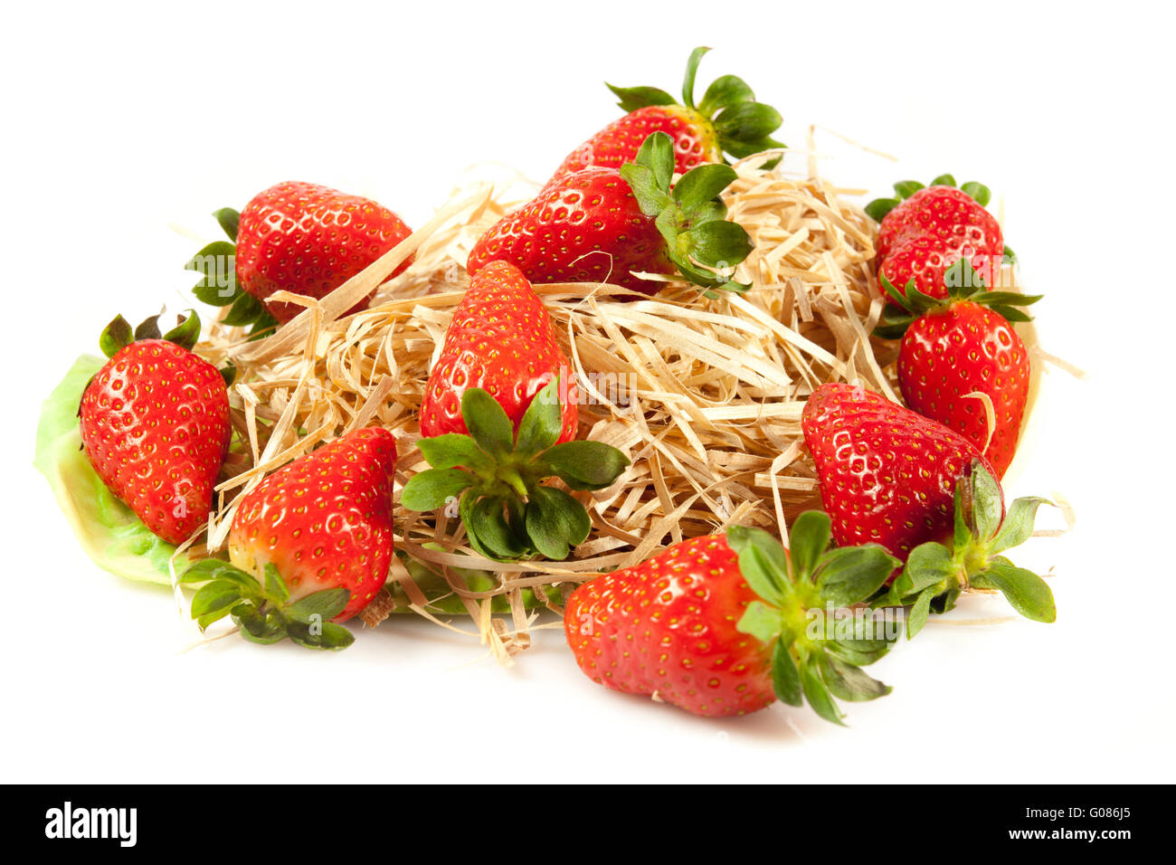 Strawberries with leaves. Isolated on a white back Stock Photo - Alamy