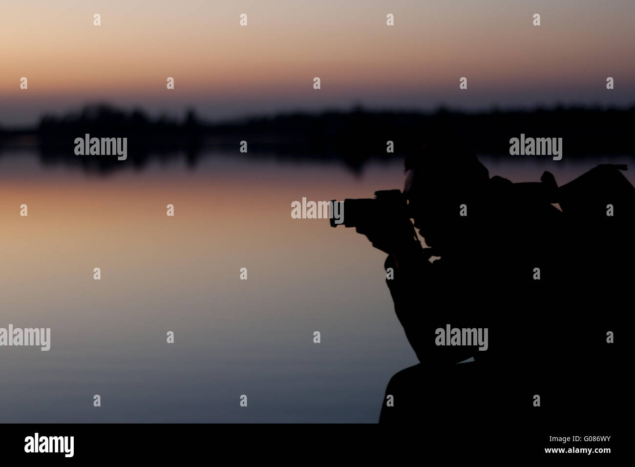 Photographer at work Stock Photo - Alamy