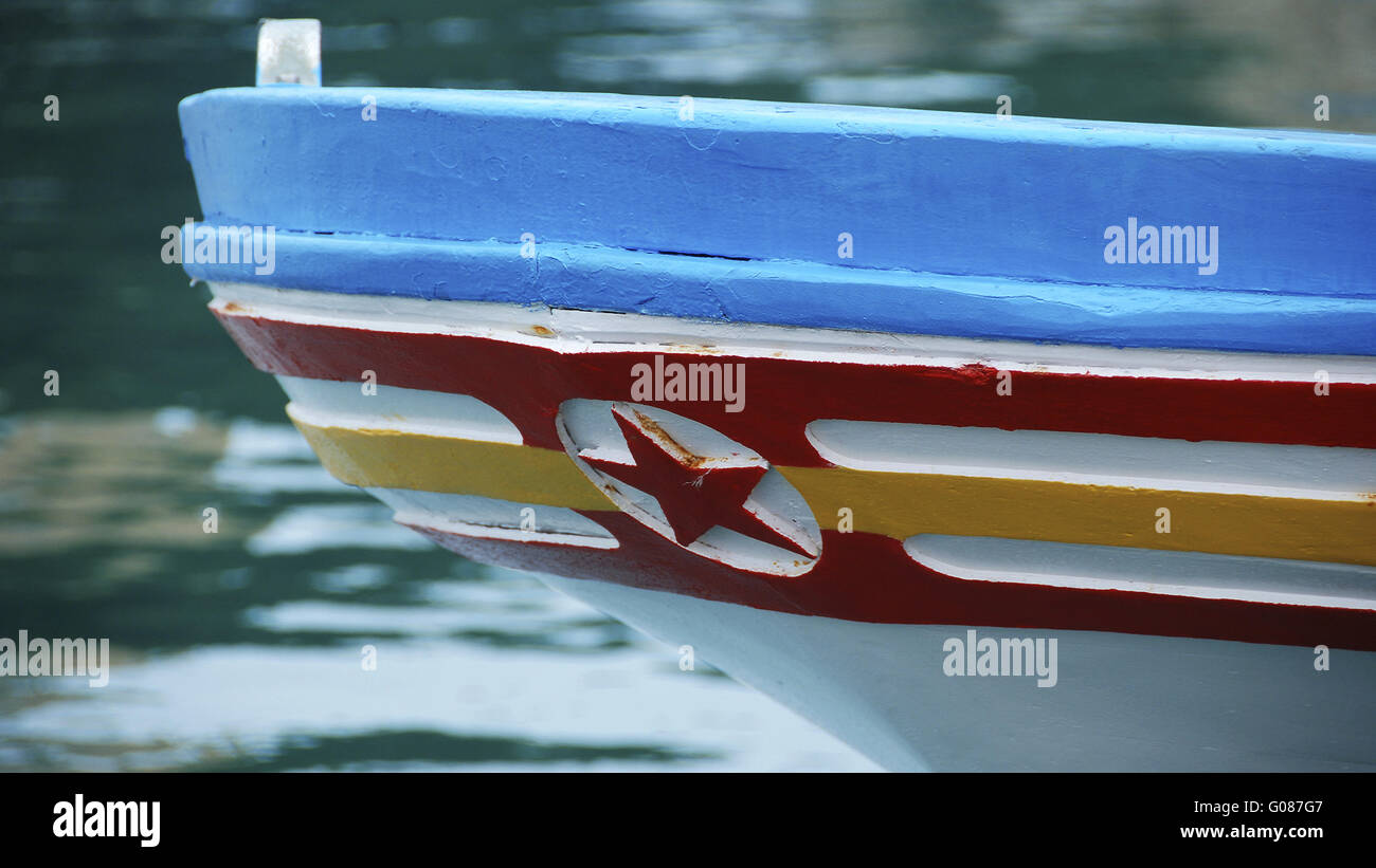 painted stern of a wooden boat with a red star Stock Photo - Alamy