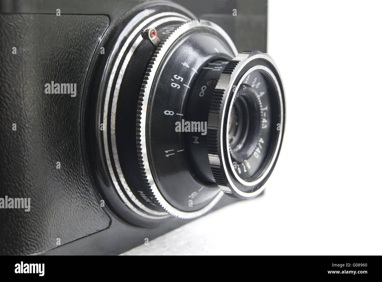 Old vintage analog camera close-up on white backgr Stock Photo - Alamy
