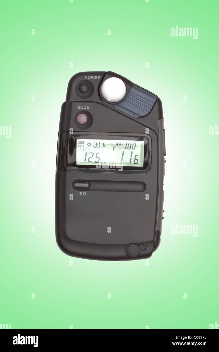 Digital flashmeter, isolated on green backrgound Stock Photo - Alamy