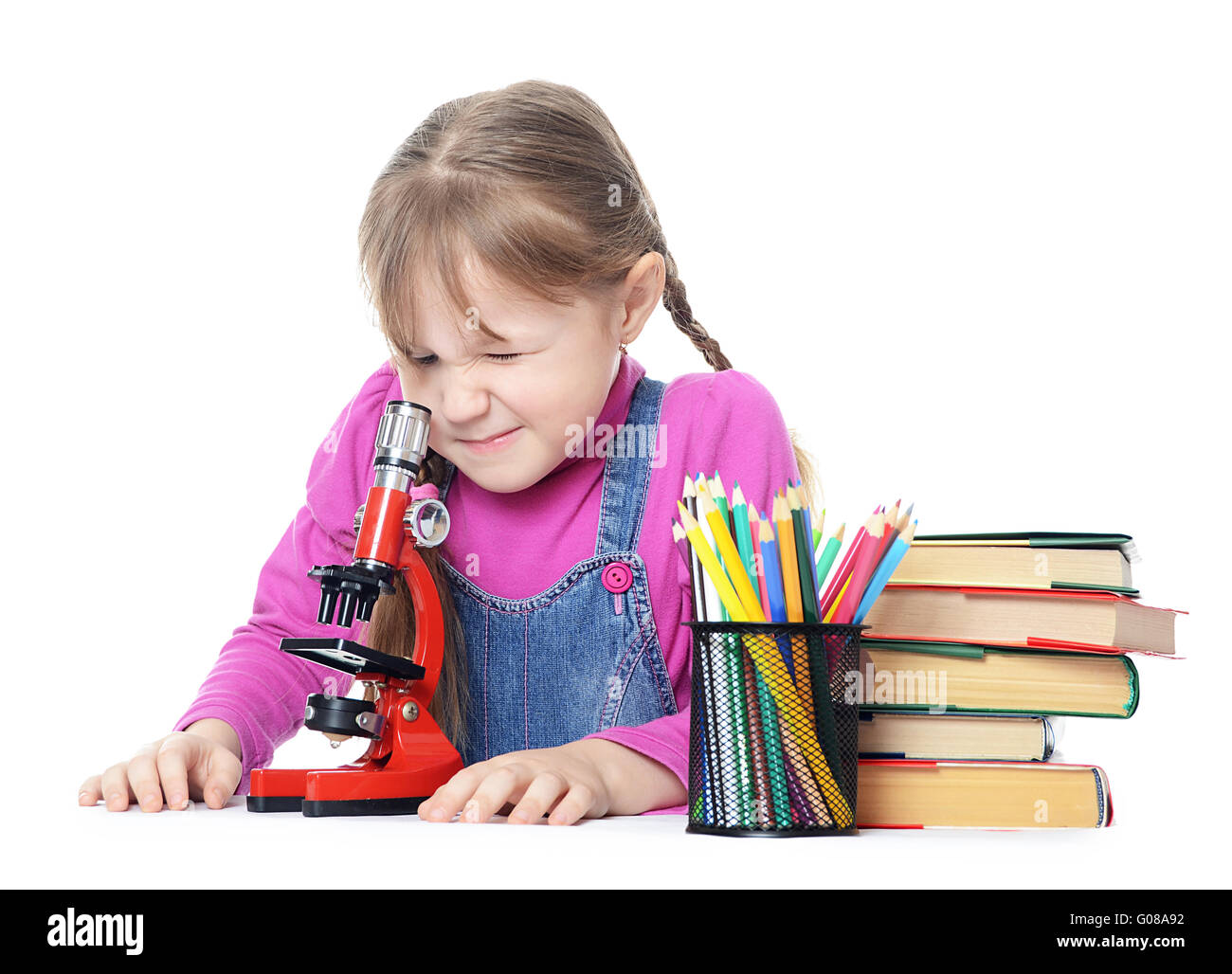 The little girl learn isolated on white background Stock Photo - Alamy