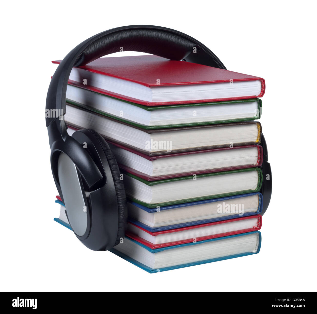 Headphones worn on a stack of books with color covers Stock Photo - Alamy
