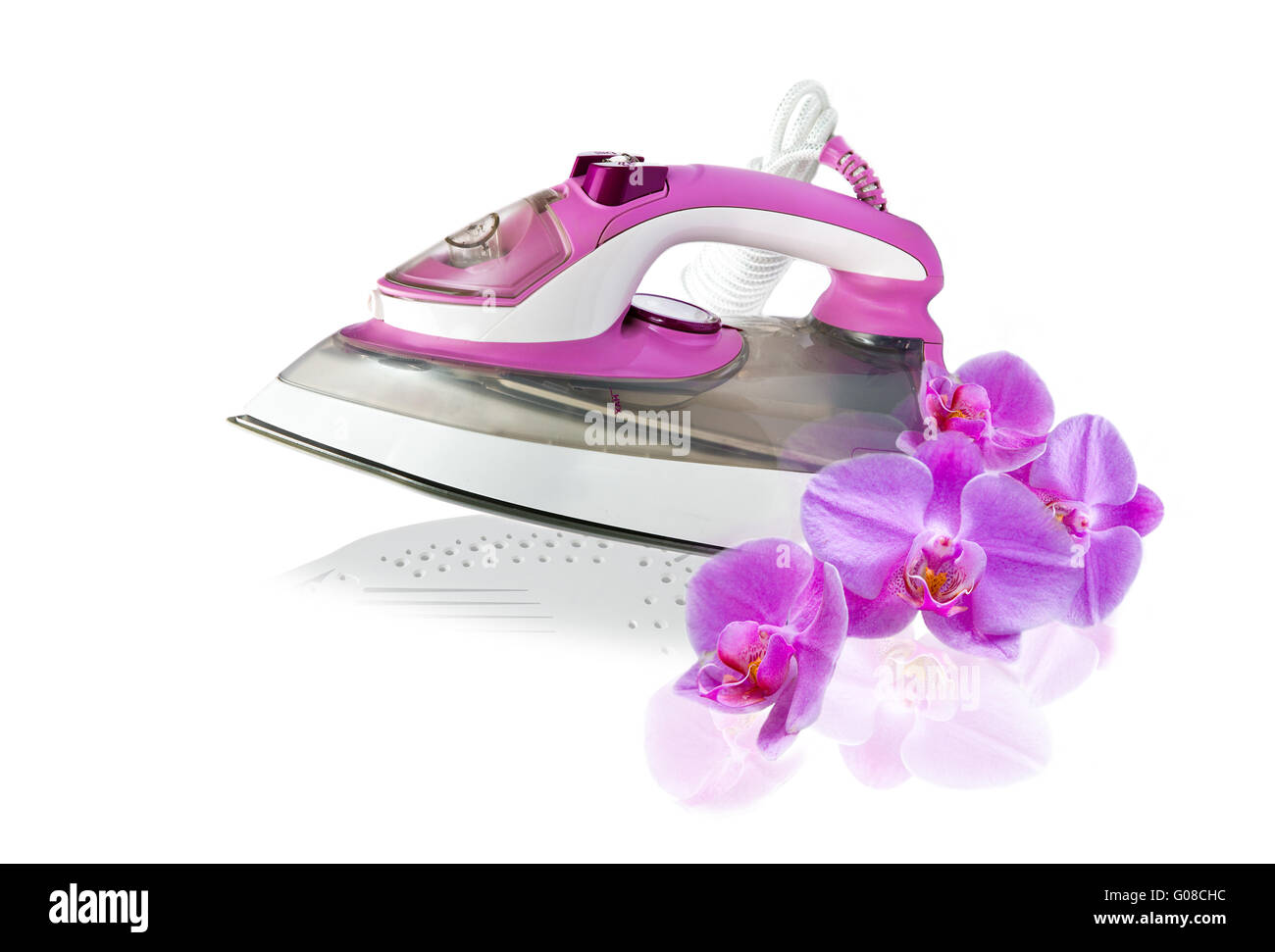 modern new pink electric iron and orchid flowers Stock Photo - Alamy