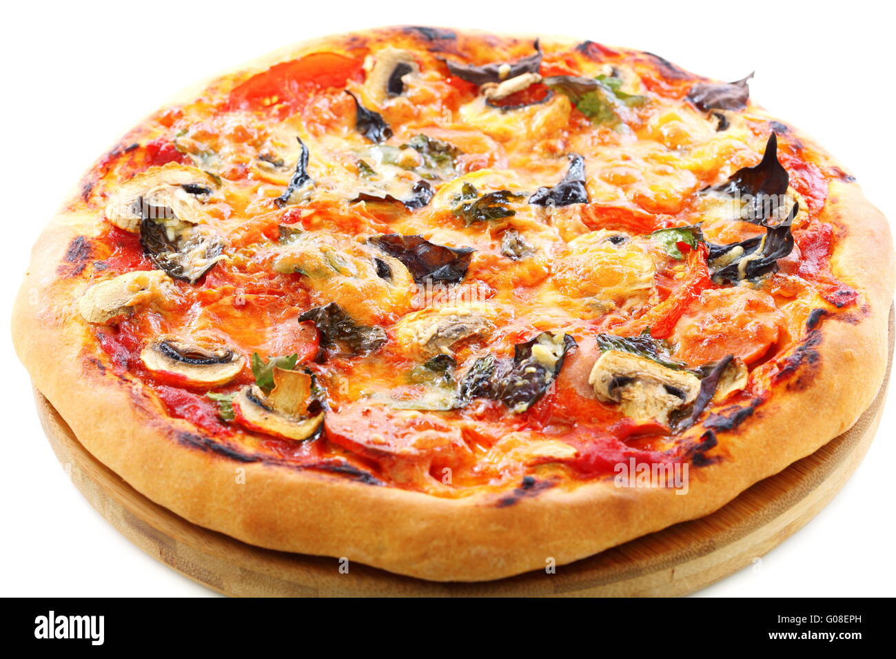Pizza with tomatoes, mushrooms and purple basil Stock Photo - Alamy