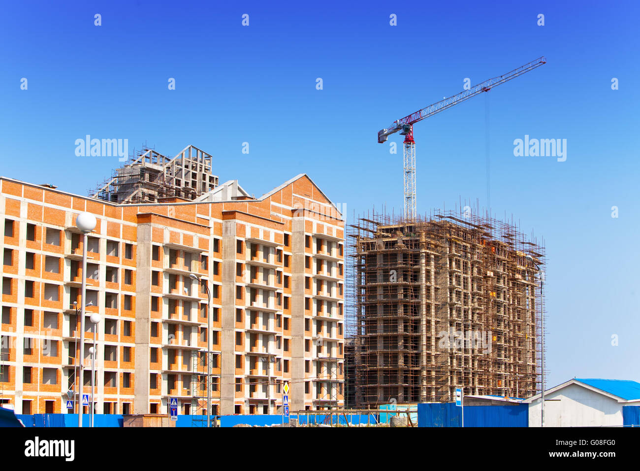 Work on a building area. Industry construction Stock Photo - Alamy