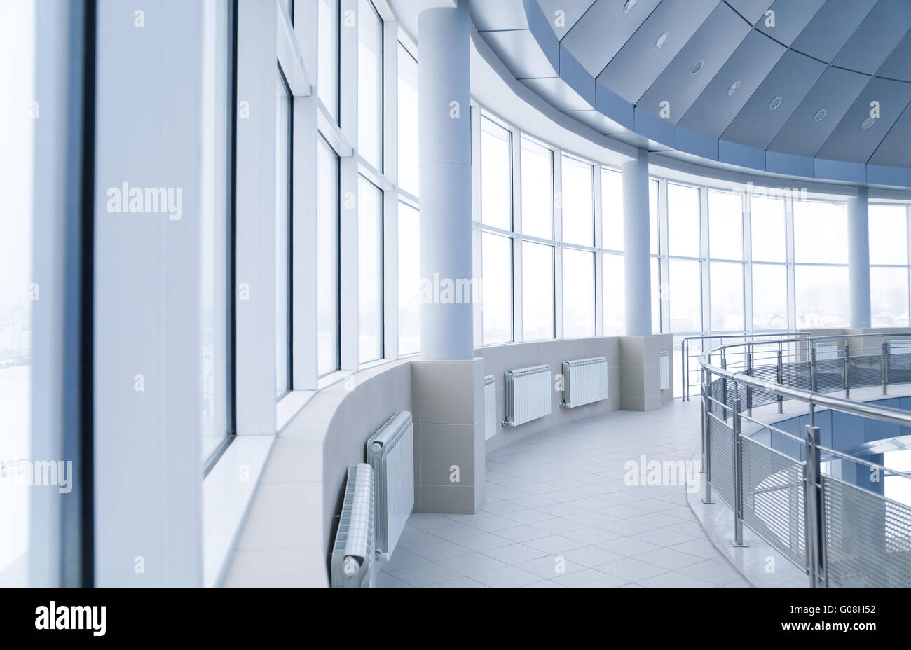 windows and columns in the rounded interior of mod Stock Photo - Alamy