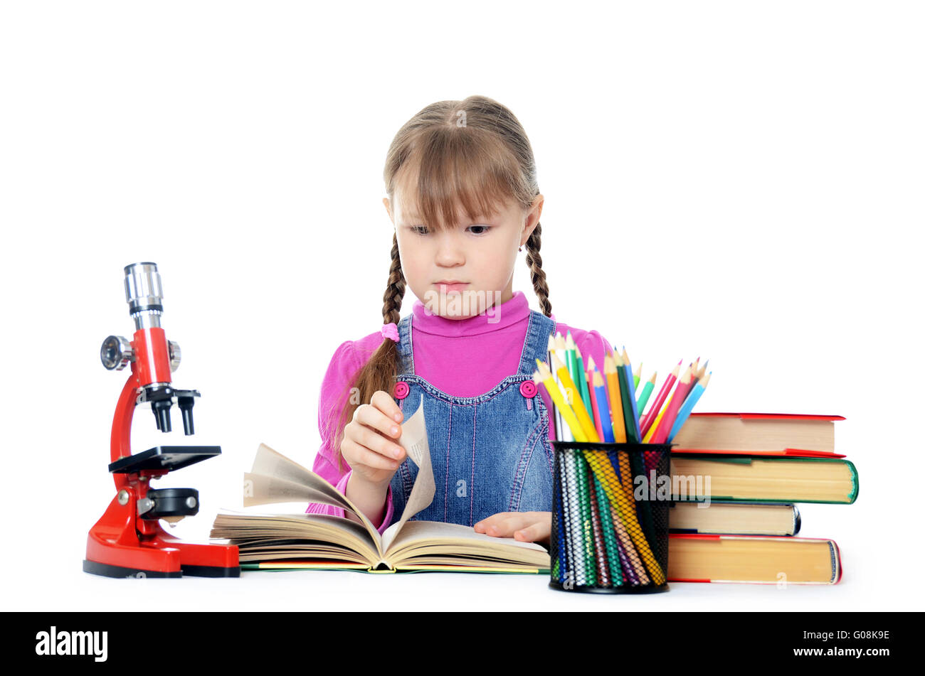 The little girl learn isolated on white background Stock Photo - Alamy
