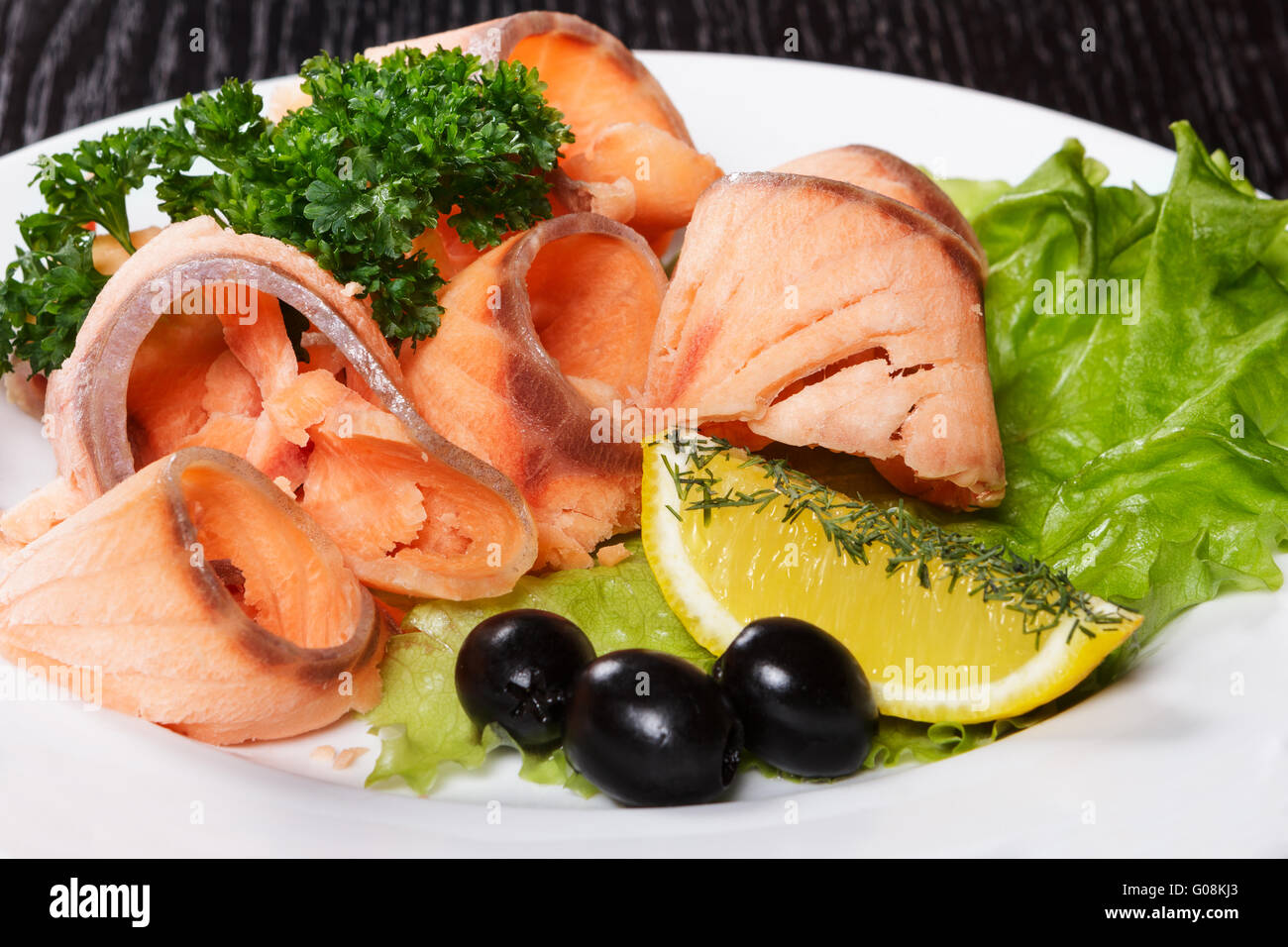Fresh-frozen fish slices with vegetables Stock Photo - Alamy