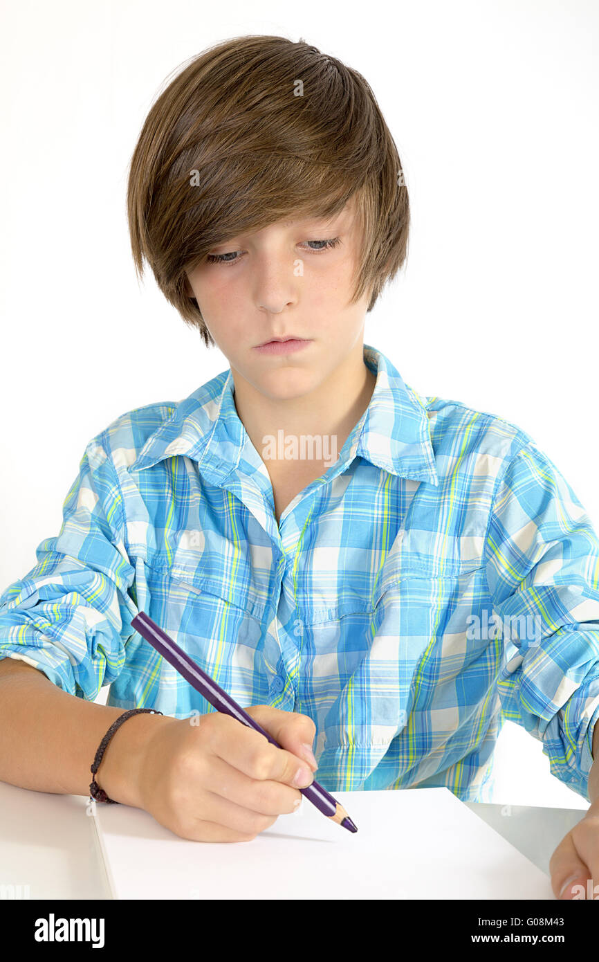 school boy working with a pencil, isolated on white Stock Photo - Alamy