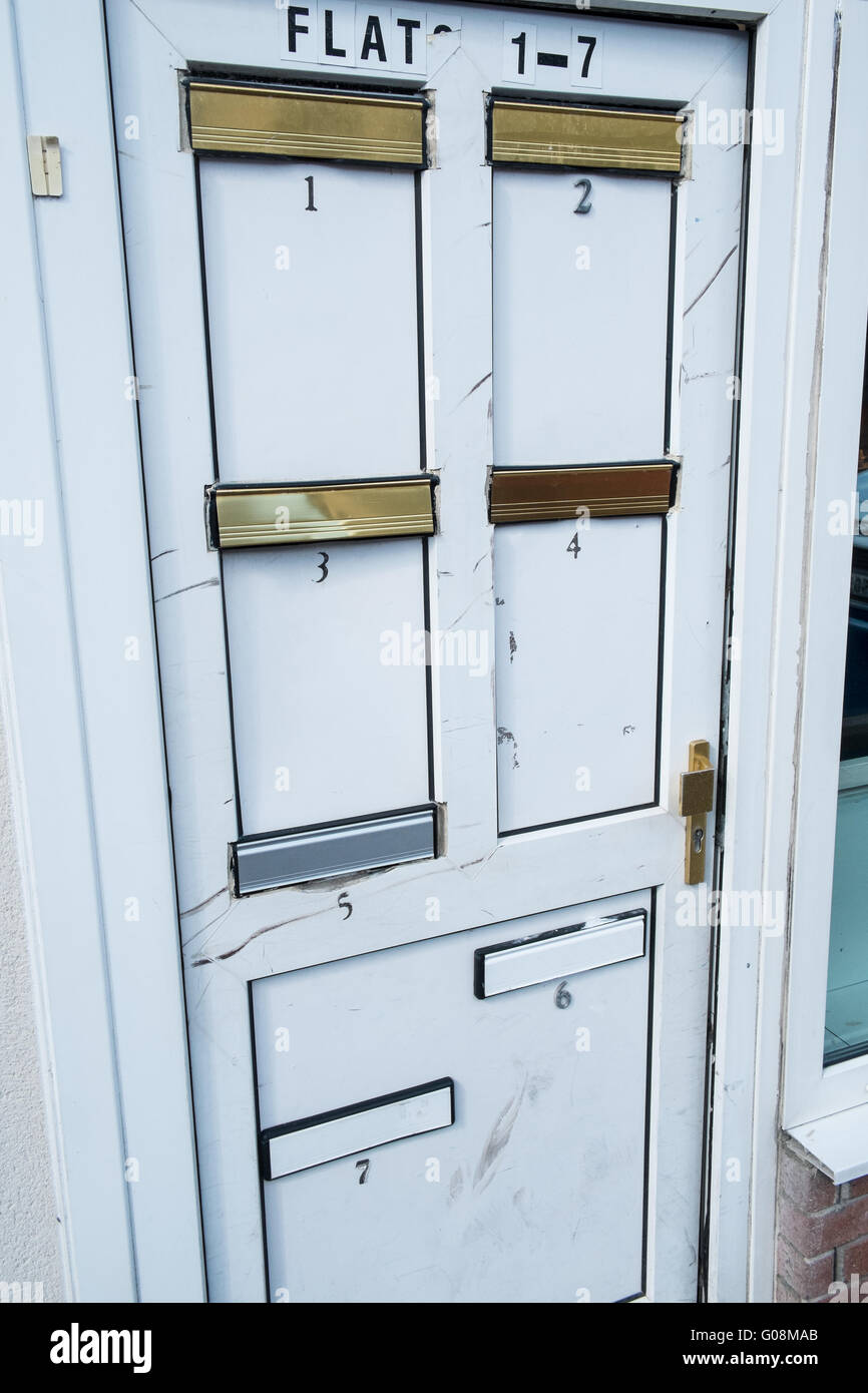 Seven letter boxes serving seven flats in multi occupancy property in ...