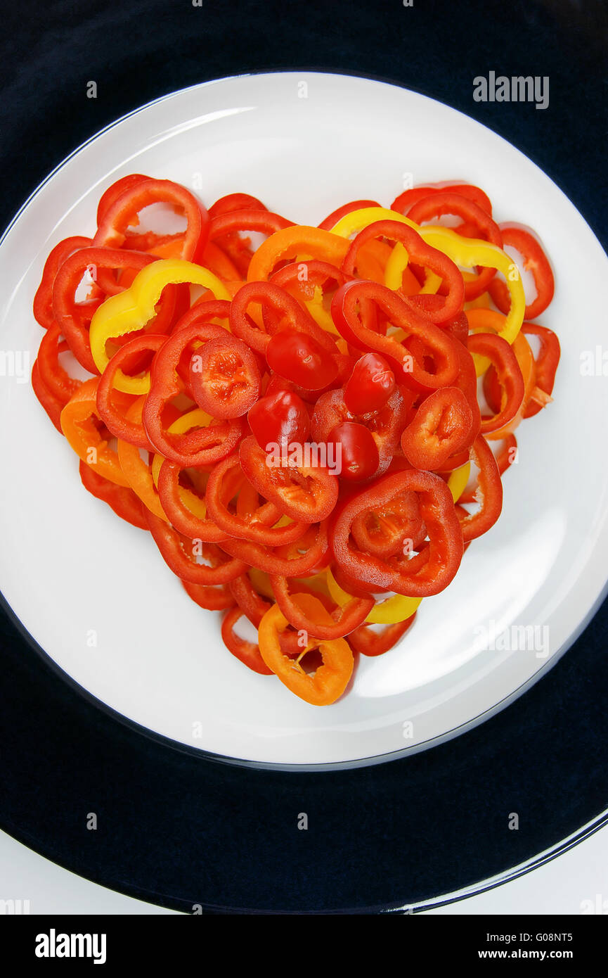 Colored heart of pepper Stock Photo - Alamy