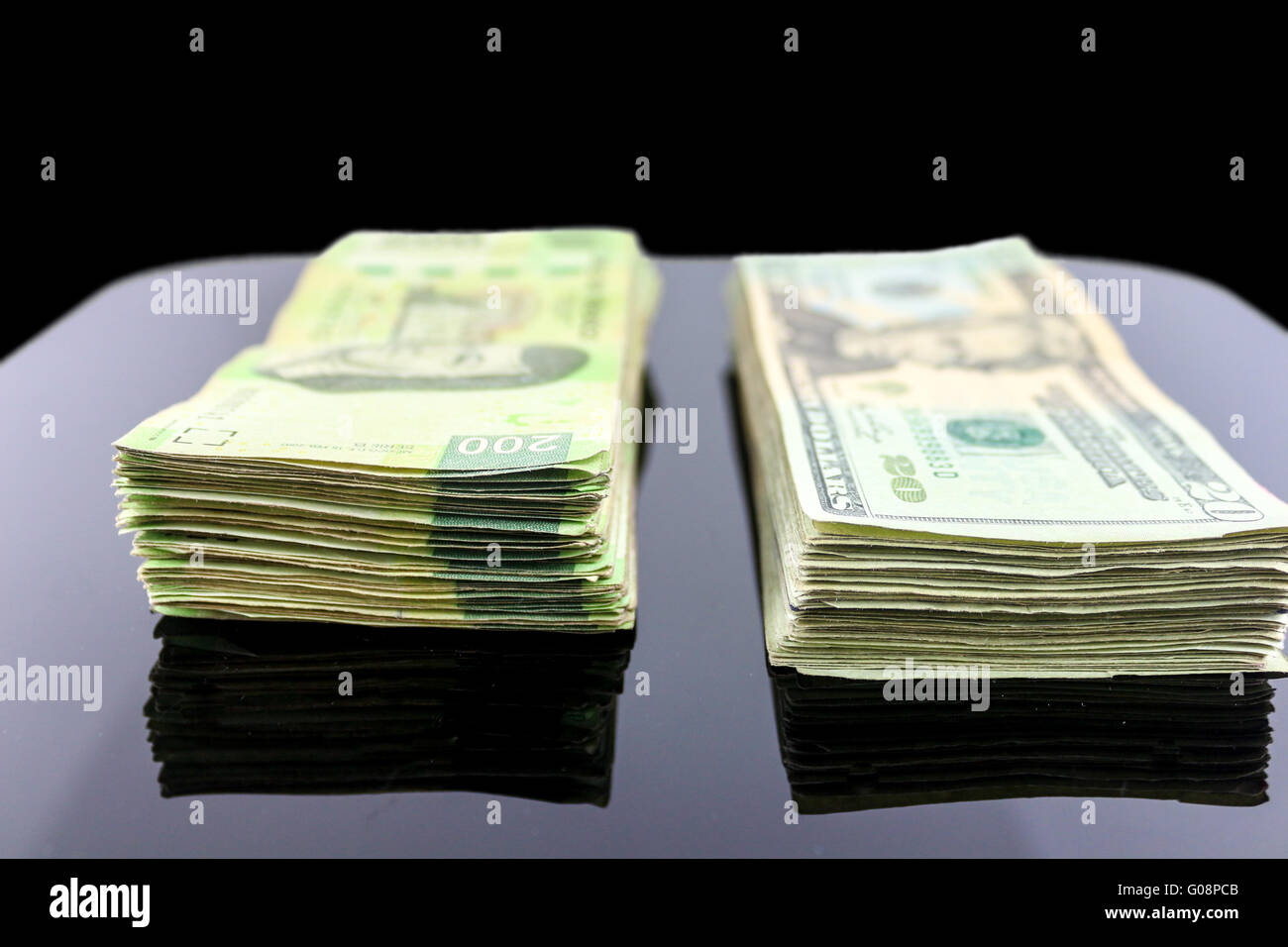 Money on the table Stock Photo - Alamy