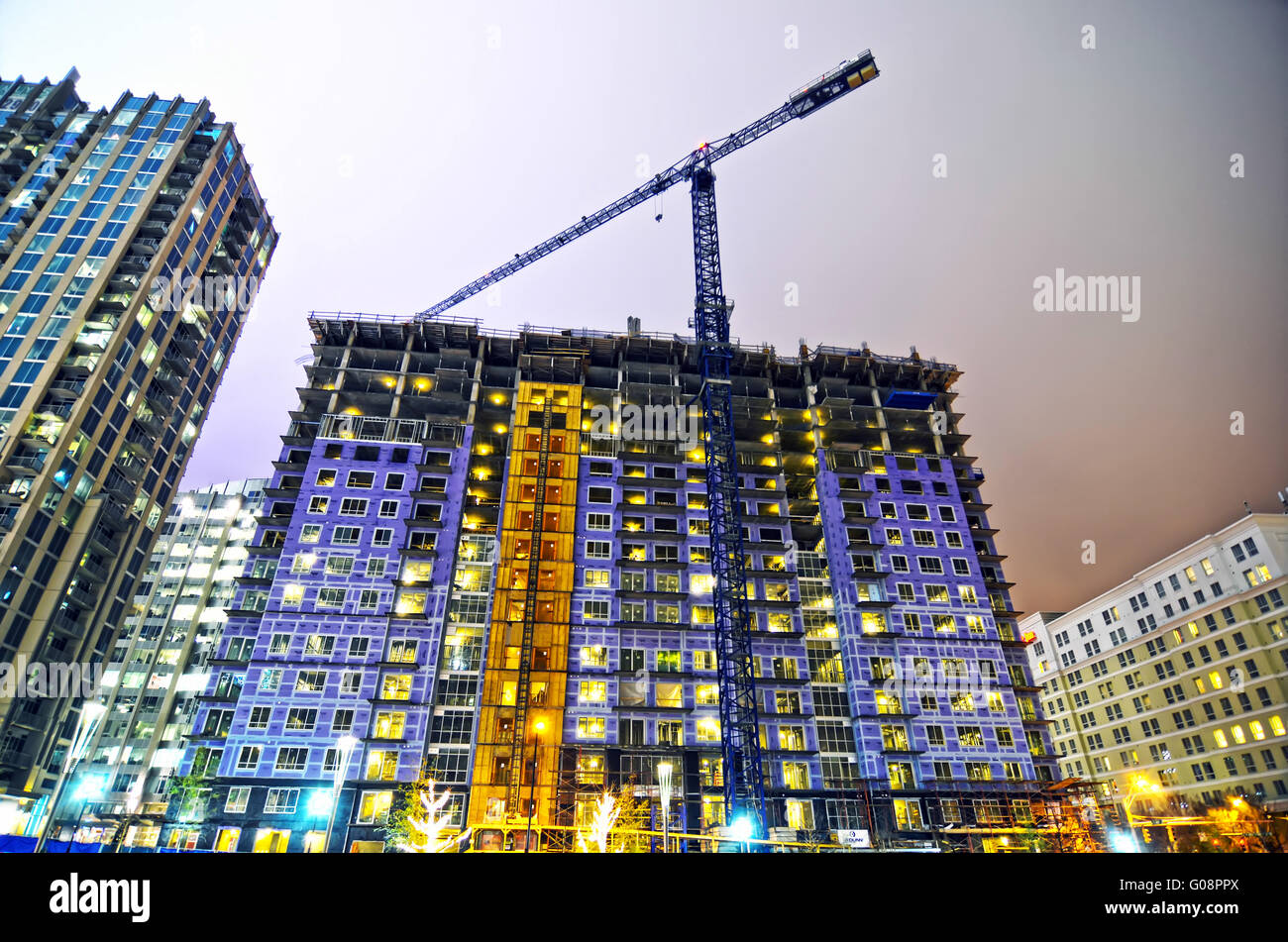 tall highrise building under construction in a big city Stock Photo - Alamy
