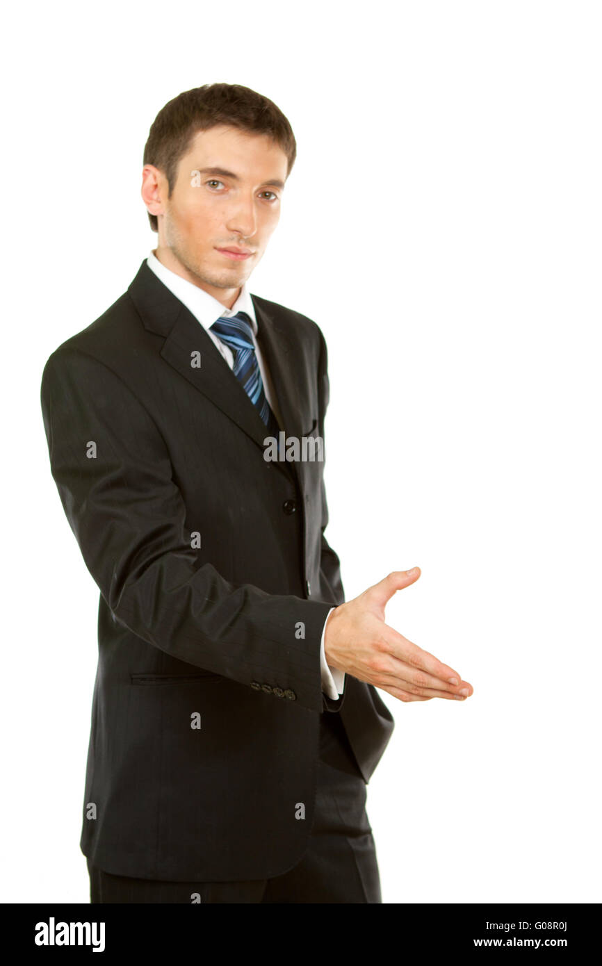 Businessman with arm out in a welcoming gesture Stock Photo - Alamy
