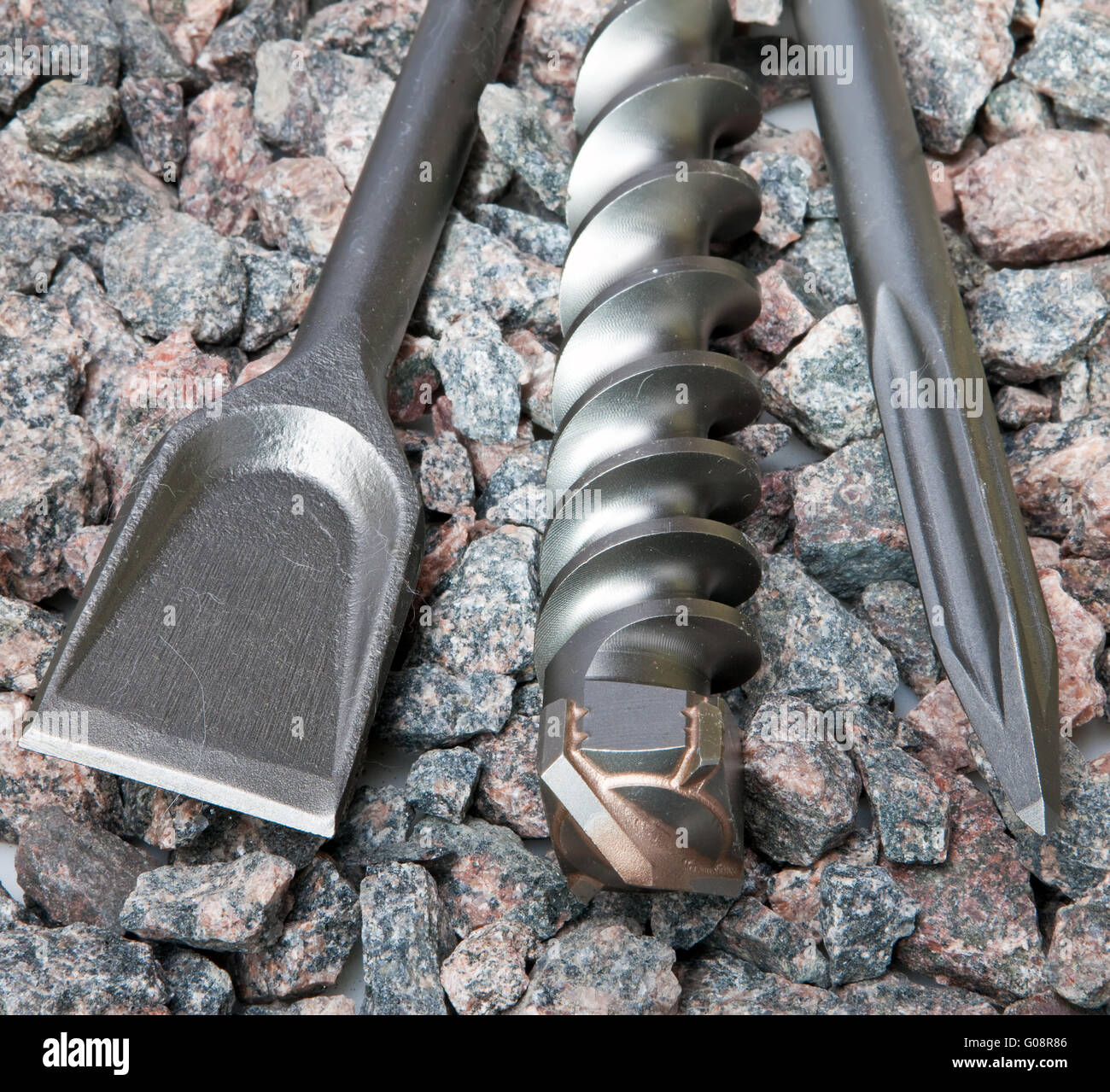 drill, pica, blade - a set of nozzles for the punc Stock Photo - Alamy