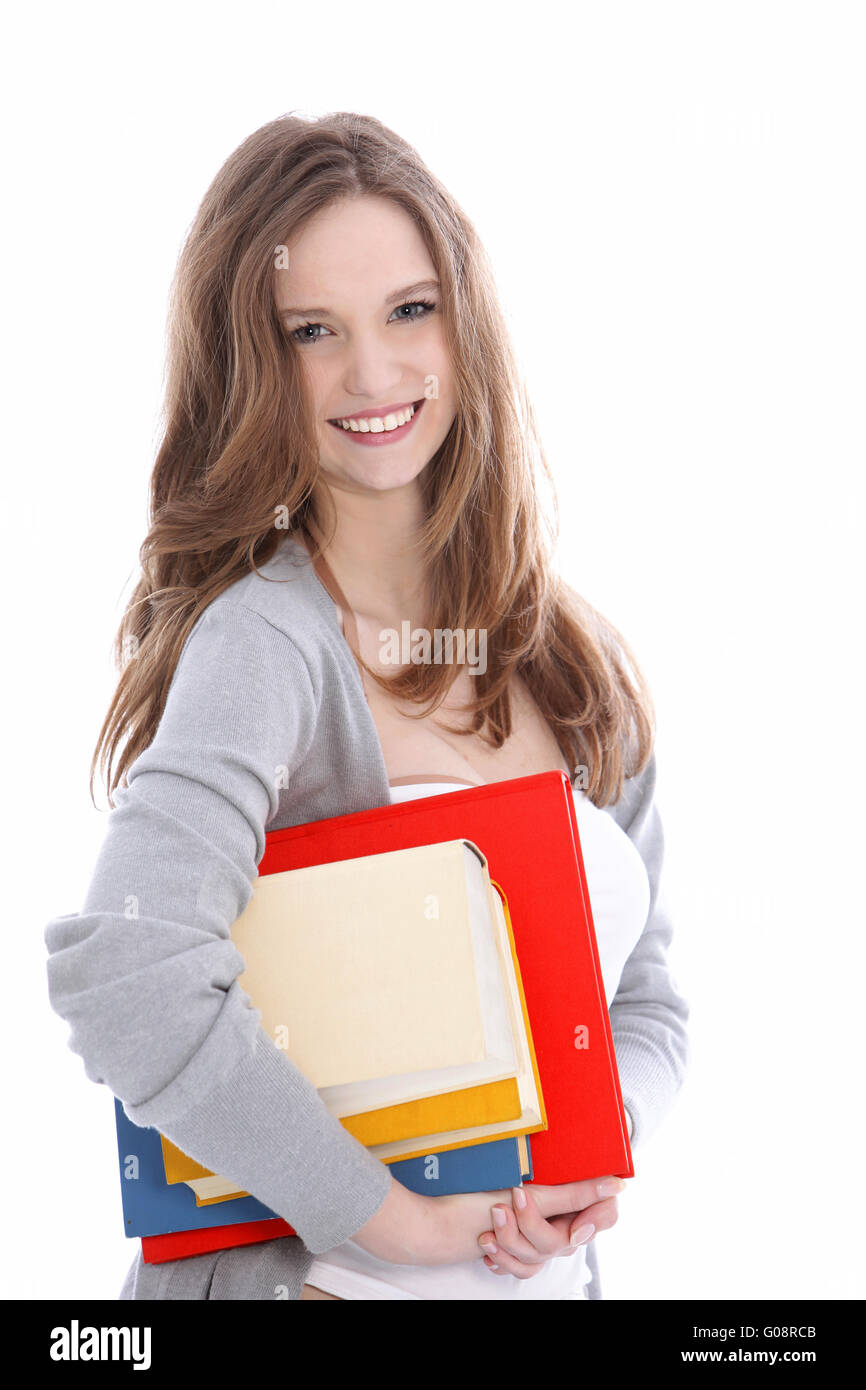 Smiling beautiful young student with books Stock Photo - Alamy