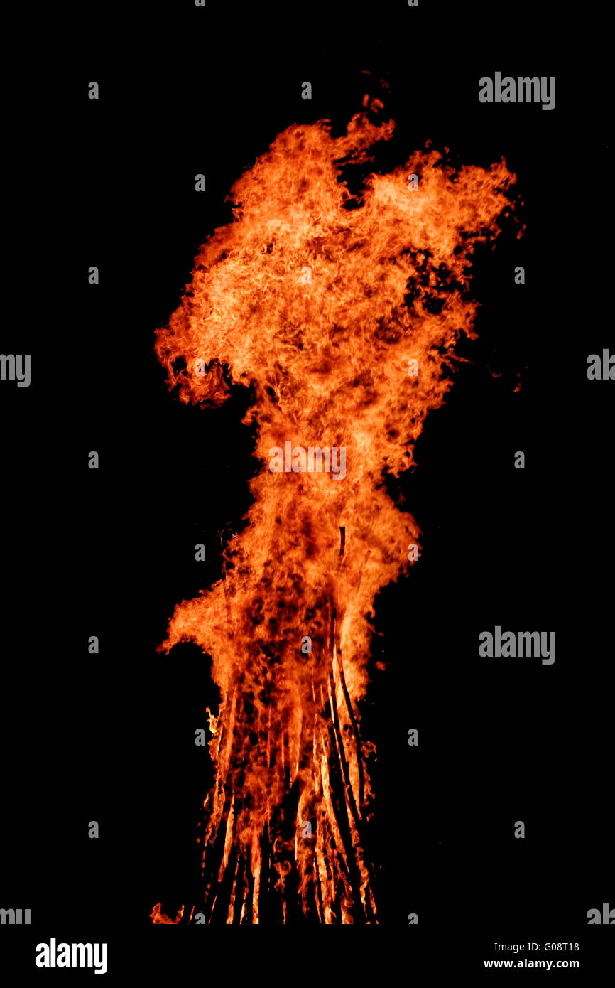 red flames of huge bonfire or campfire as black backgorund Stock Photo ...
