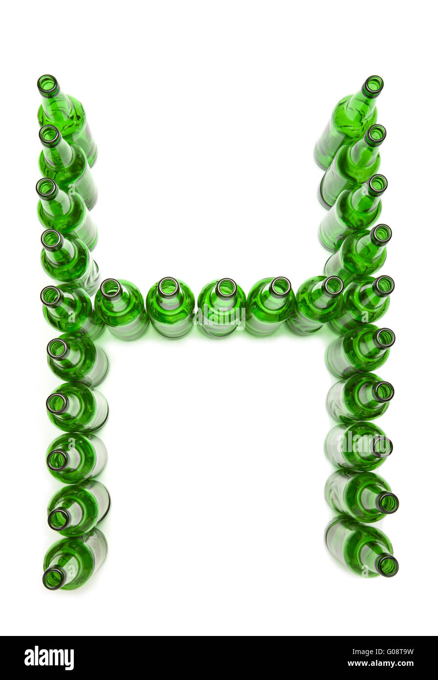 The alphabet from glass beer bottles. Letter H Stock Photo - Alamy