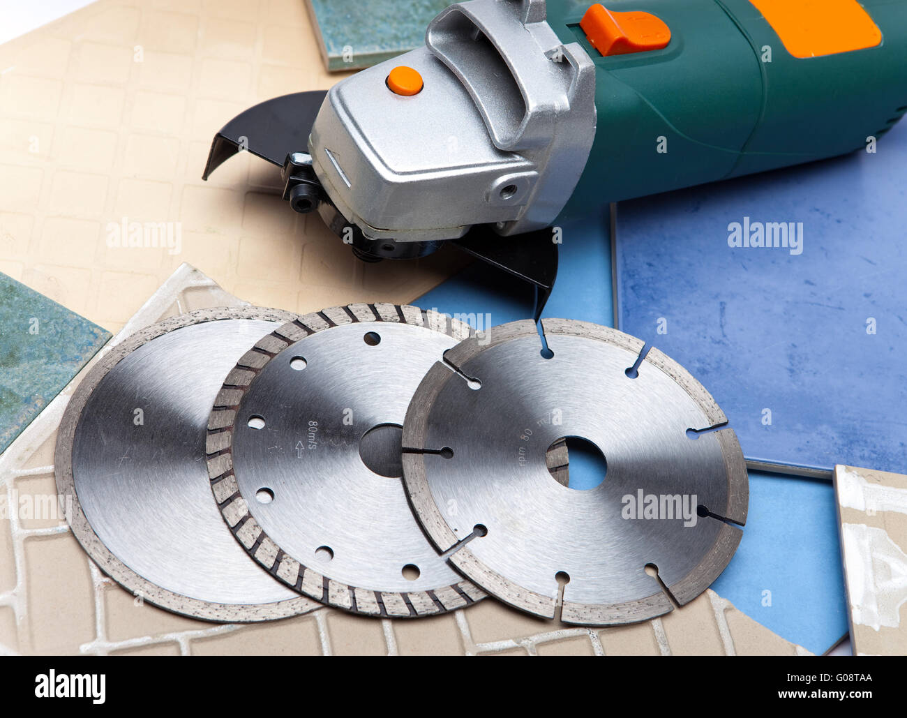 The cutting machine and various detachable disks Stock Photo - Alamy