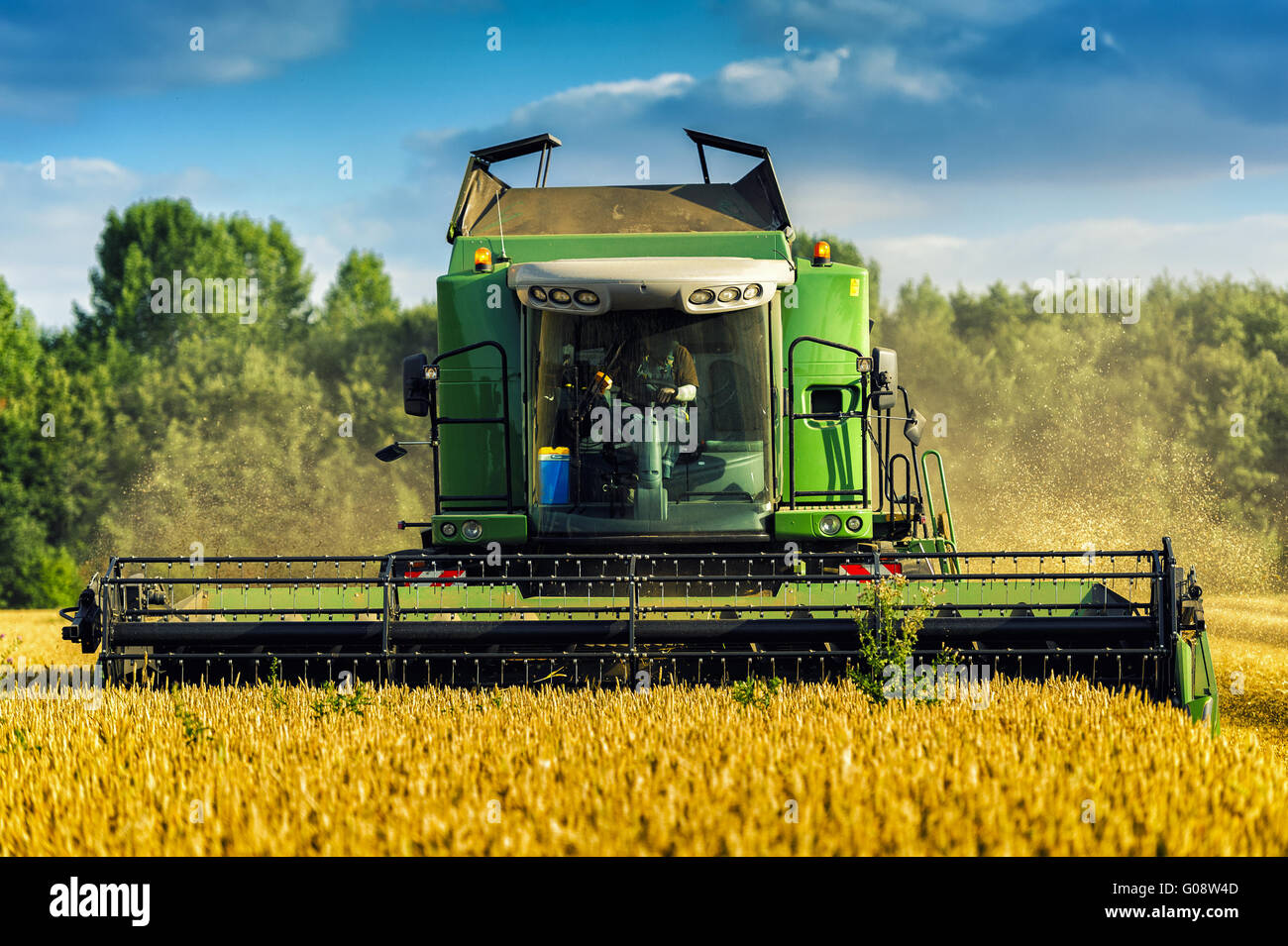 Combines at work during wheat harvest hi-res stock photography and ...