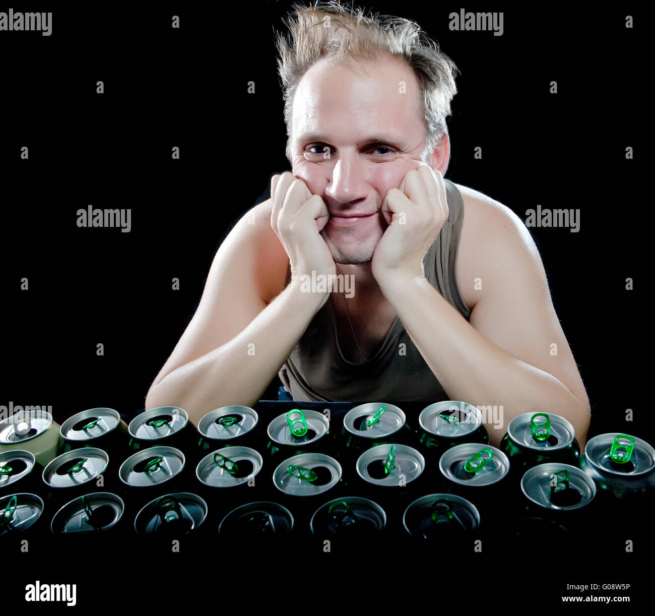 The drunk man and is a lot of empty beer cans Stock Photo - Alamy