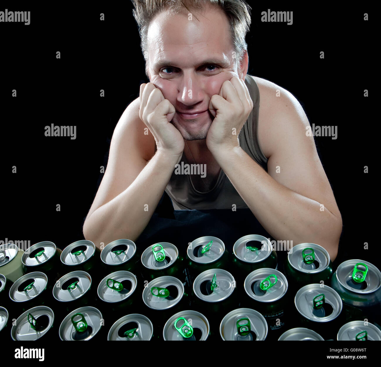The drunk man and is a lot of empty beer cans Stock Photo - Alamy