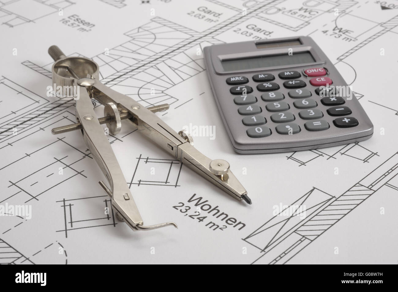 house construction plan with circle and calculator Stock Photo - Alamy