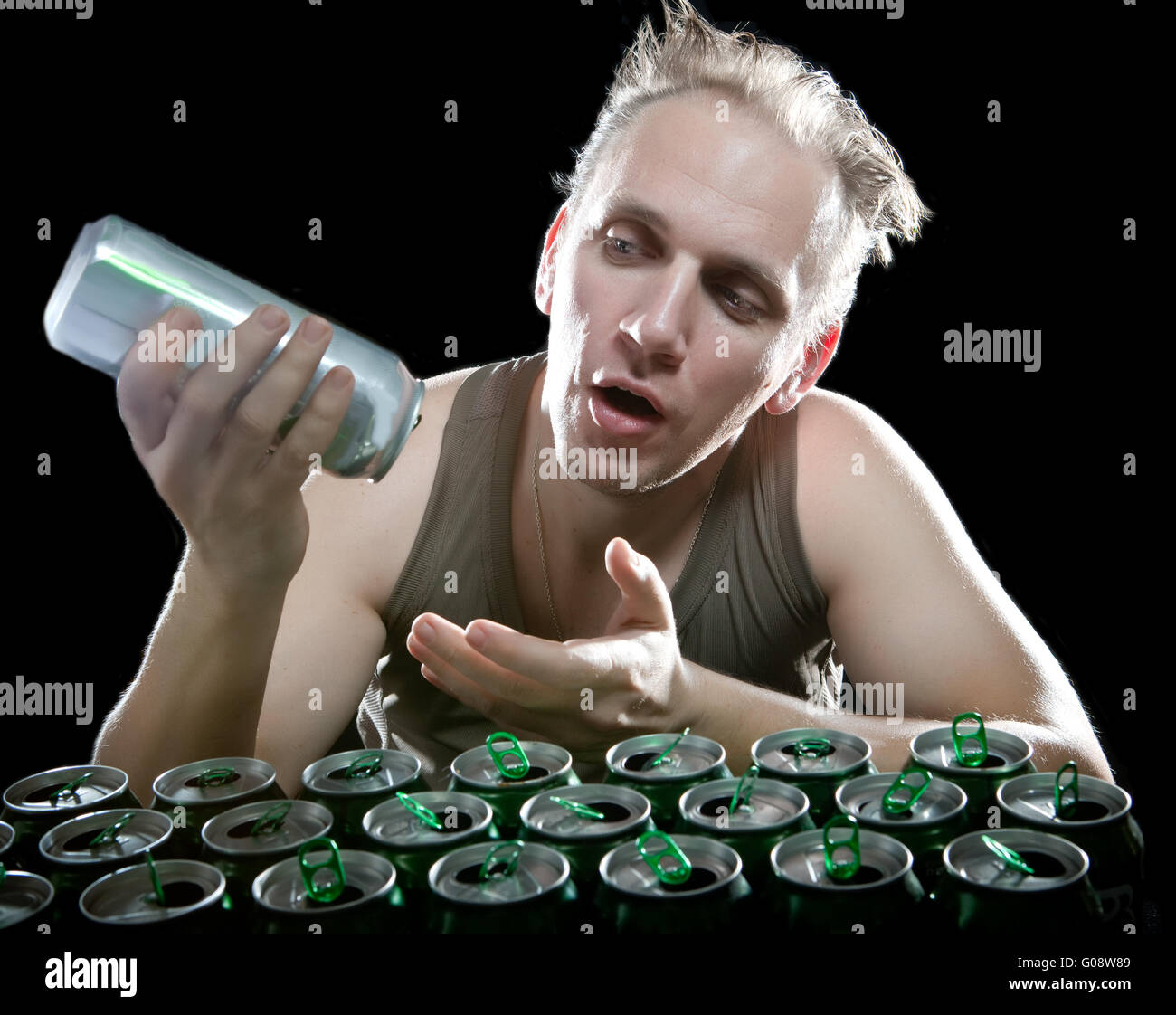 The man wants to drink the last drink of beer from Stock Photo - Alamy