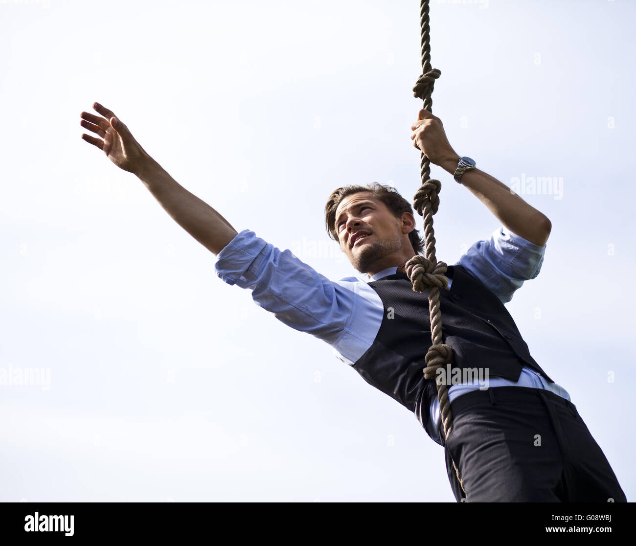 Climbing a rope hi-res stock photography and images - Alamy