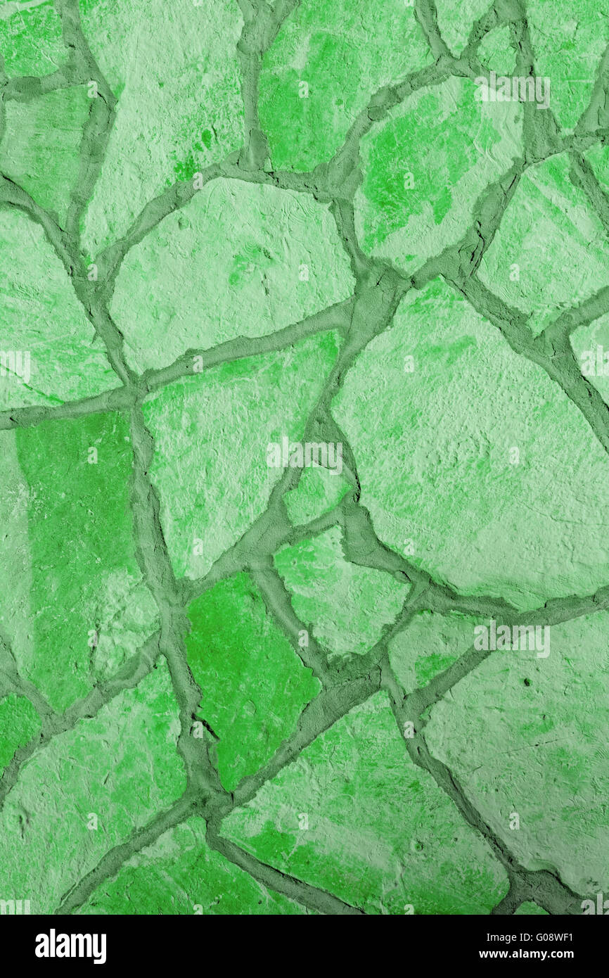 Background of a large stone wall texture (green Stock Photo - Alamy