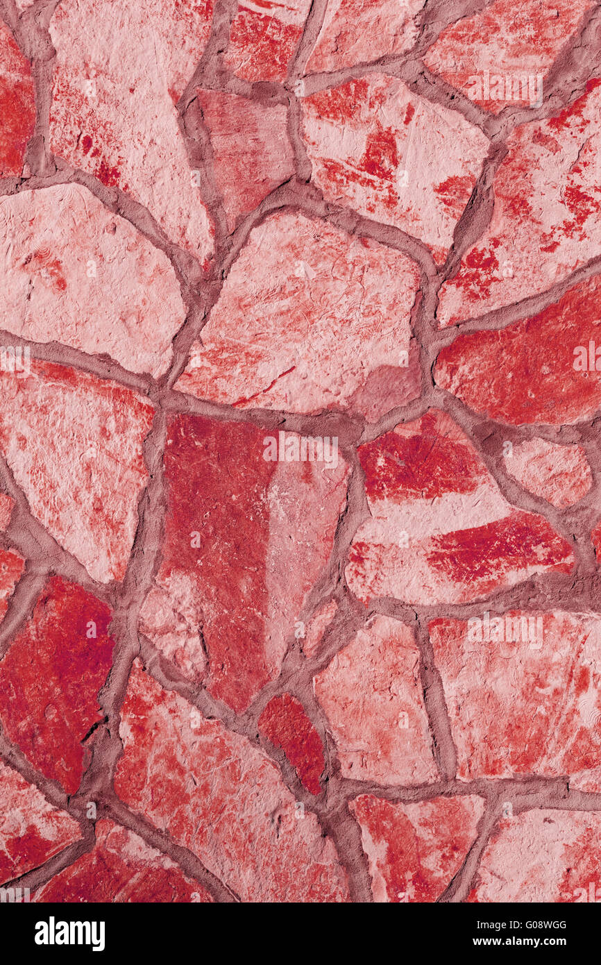 Background of a large stone wall texture (red Stock Photo - Alamy