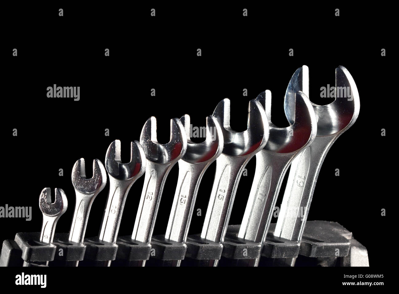 Set of brilliant nut keys of different sizes on su Stock Photo - Alamy