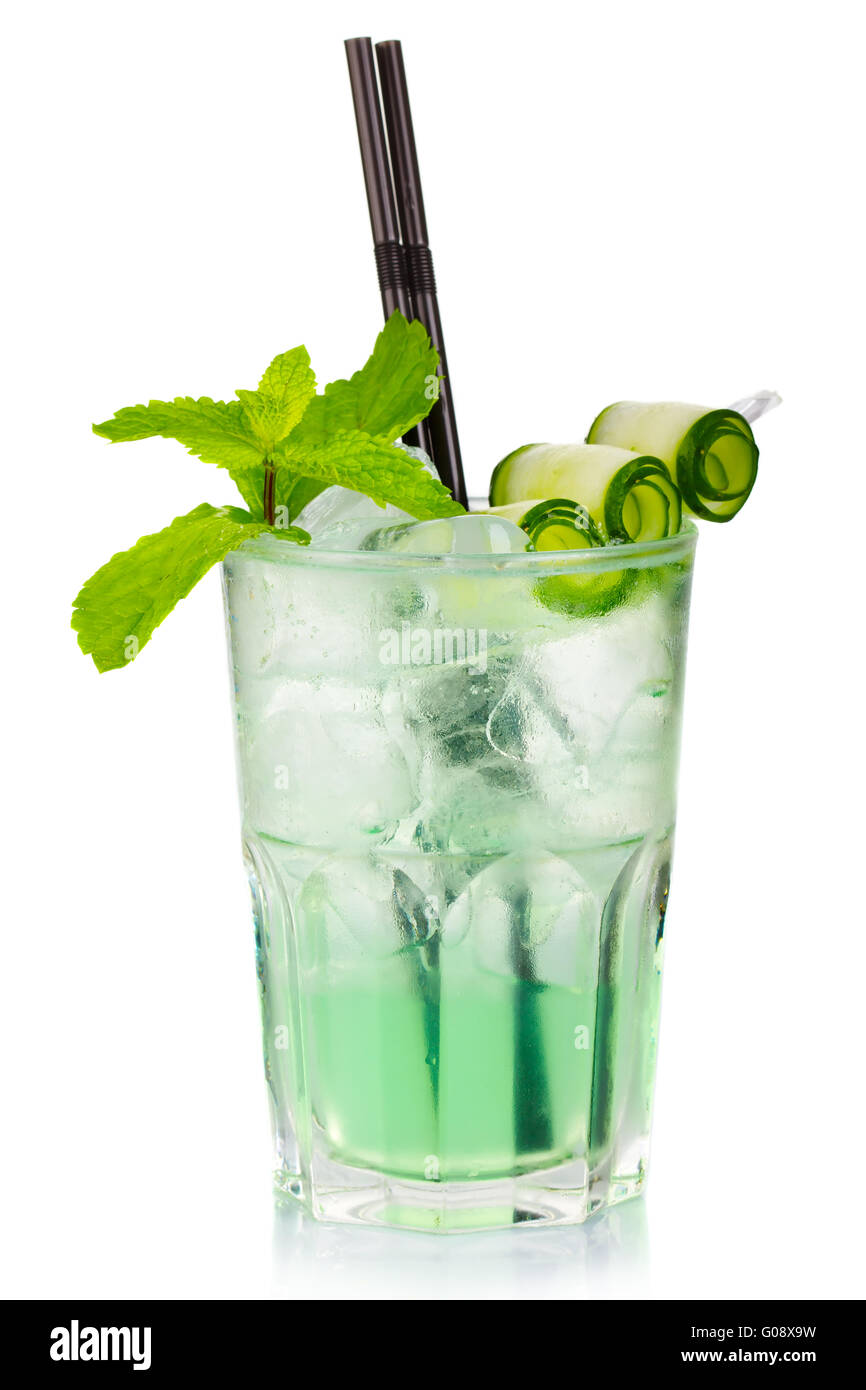 Green alcohol cocktail with fresh mint and cucumber slices isolated ...