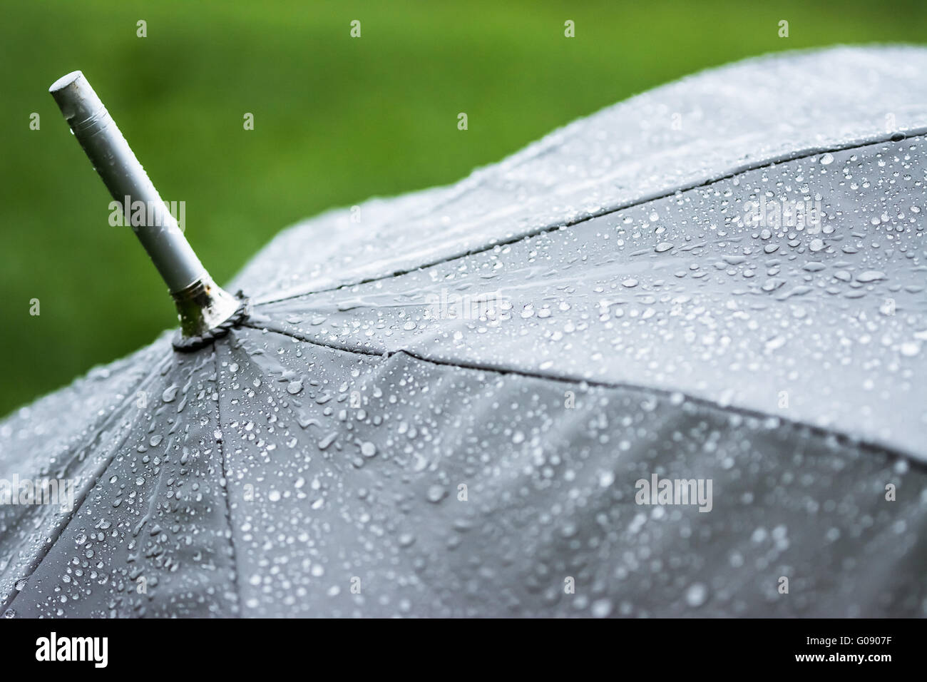 open umbrella with raindrops Stock Photo - Alamy