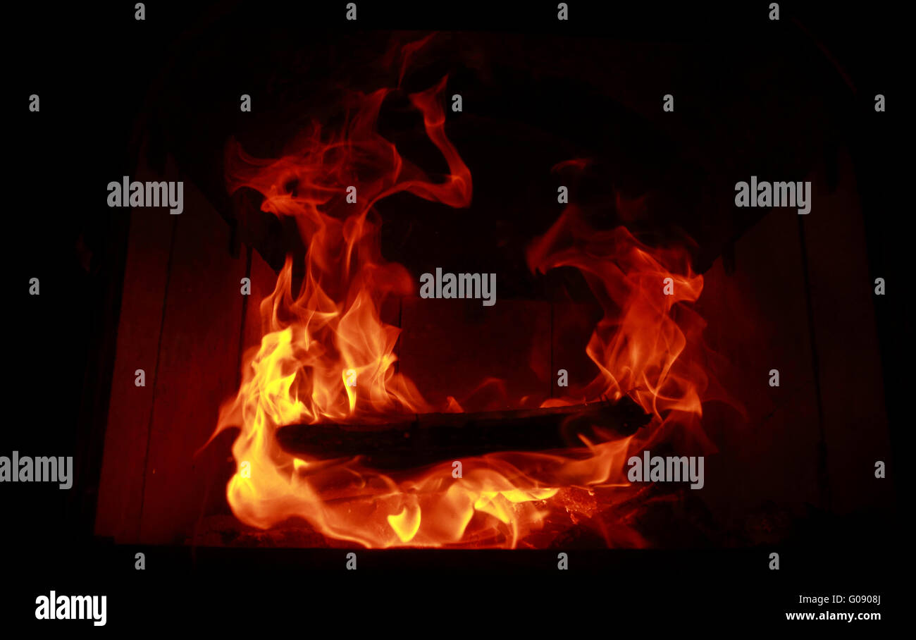 Fire flames with reflection on black background Stock Photo - Alamy